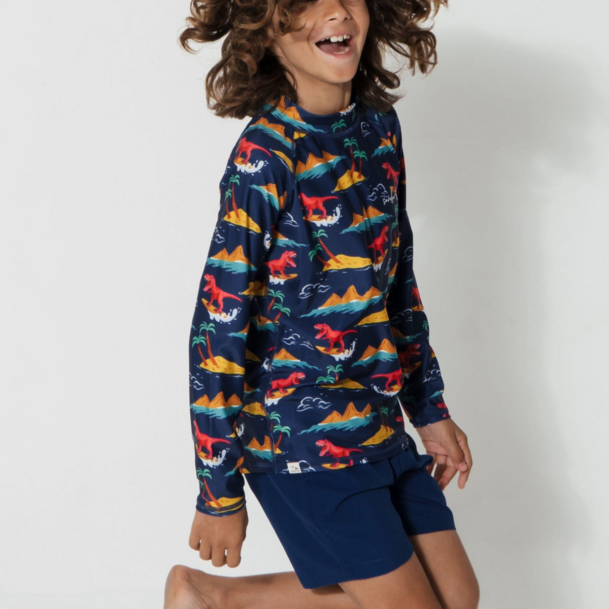 Surfing Dinosaur Rash Guard | Sandbar – Sandbar